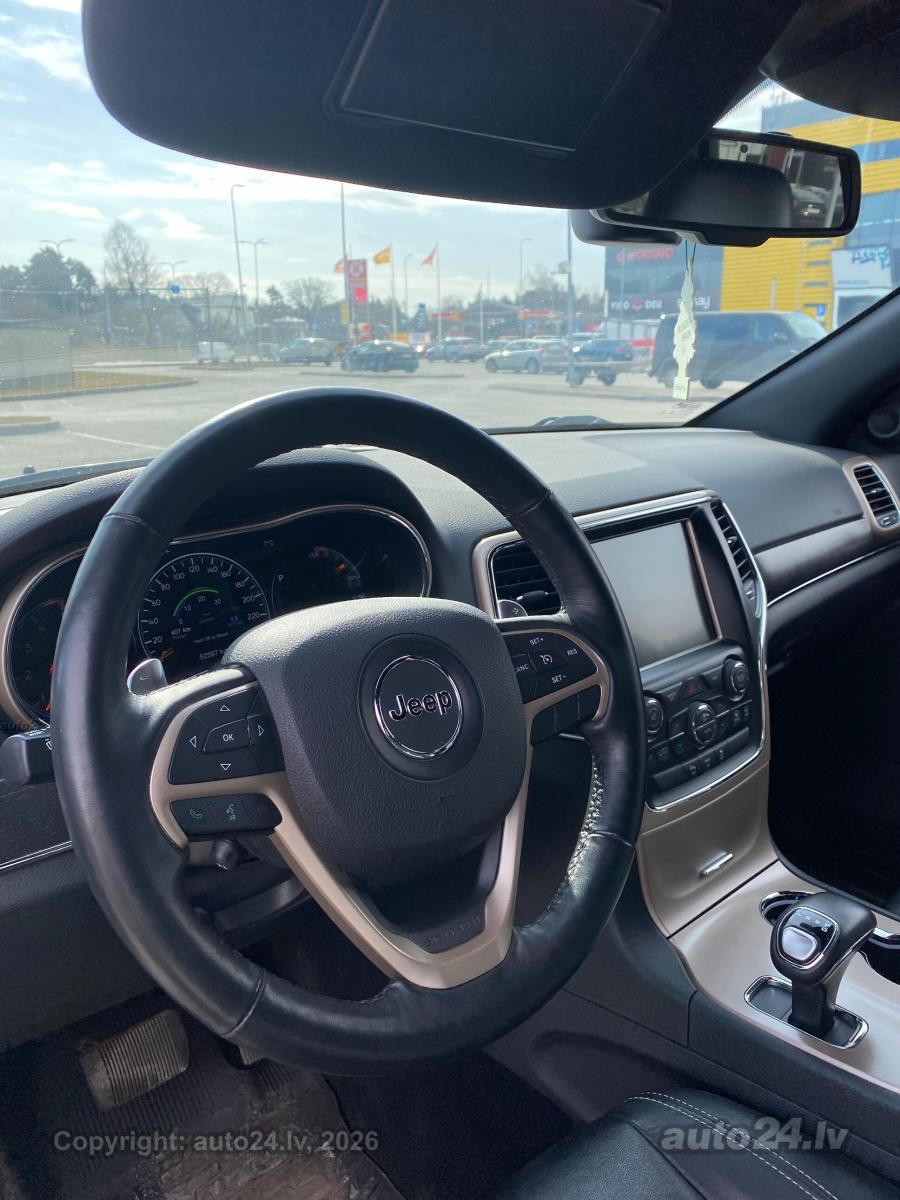 White Jeep Grand Cherokee 2015 in Tallinn, with an engine capacity of 3.00 L and mileage of 94 thousand km for 16490 €, photo 8 on AUTOMOTO.COM.LV