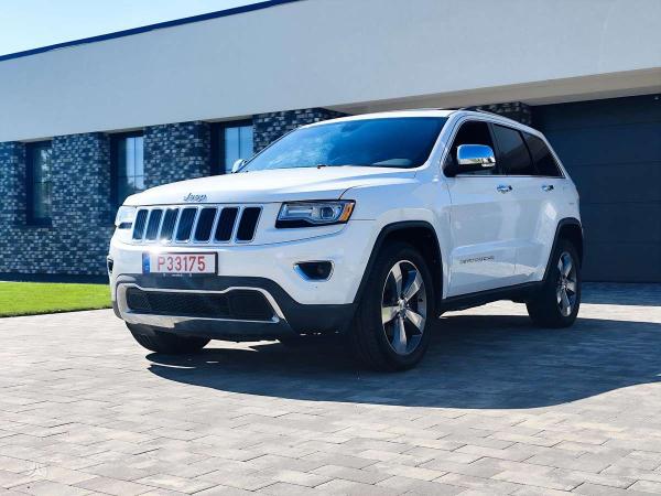 White Jeep Grand Cherokee 2015 in Kaunas, with an engine capacity of 3.60 L and mileage of 238 thousand km for 12500 €, photo 1 on AUTOMOTO.COM.LV