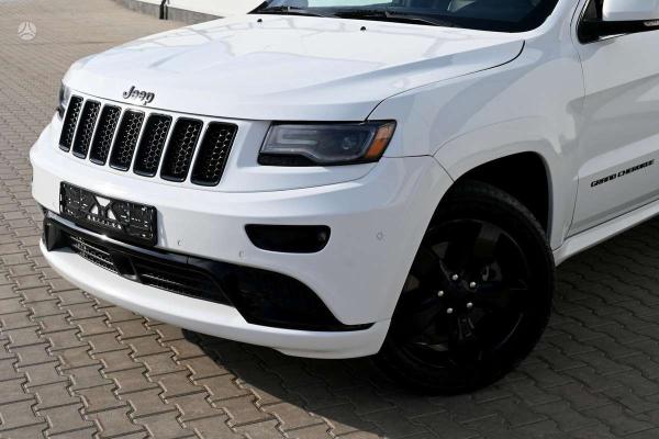 Balts Jeep Grand Cherokee 2015 Kretinga, ar dzinēja tilpumu 5.65 L un nobraukumu 164 tūkst. km par 14499 €, foto 4 vietnē AUTOMOTO.COM.LV