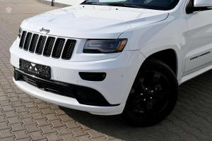 White Jeep Grand Cherokee 2015 in Kretinga, with an engine capacity of 5.65 L and mileage of 164 thousand km for 14499 €, photo 5 on AUTOMOTO.COM.LV