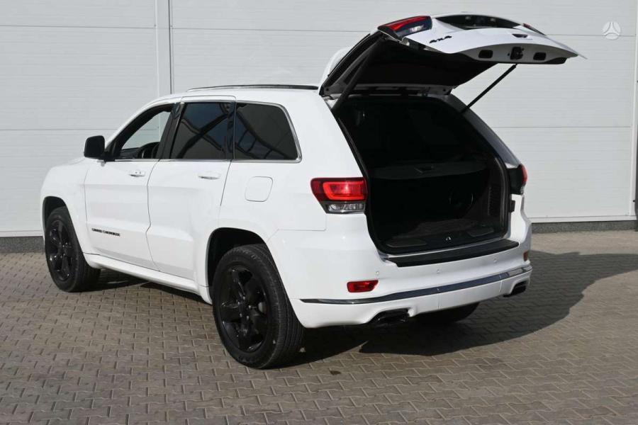 White Jeep Grand Cherokee 2015 in Kretinga, with an engine capacity of 5.65 L and mileage of 164 thousand km for 14499 €, photo 13 on AUTOMOTO.COM.LV