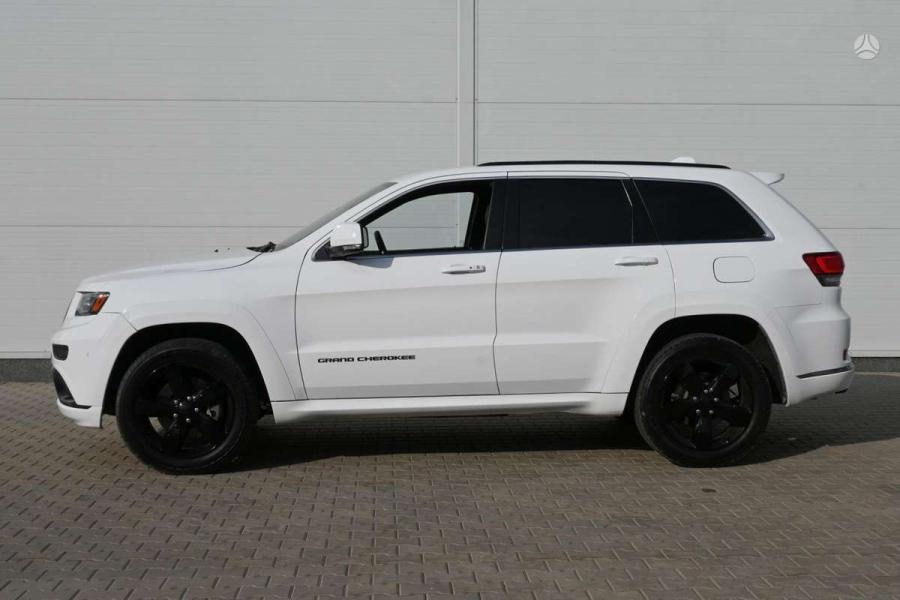 White Jeep Grand Cherokee 2015 in Kretinga, with an engine capacity of 5.65 L and mileage of 164 thousand km for 14499 €, photo 14 on AUTOMOTO.COM.LV