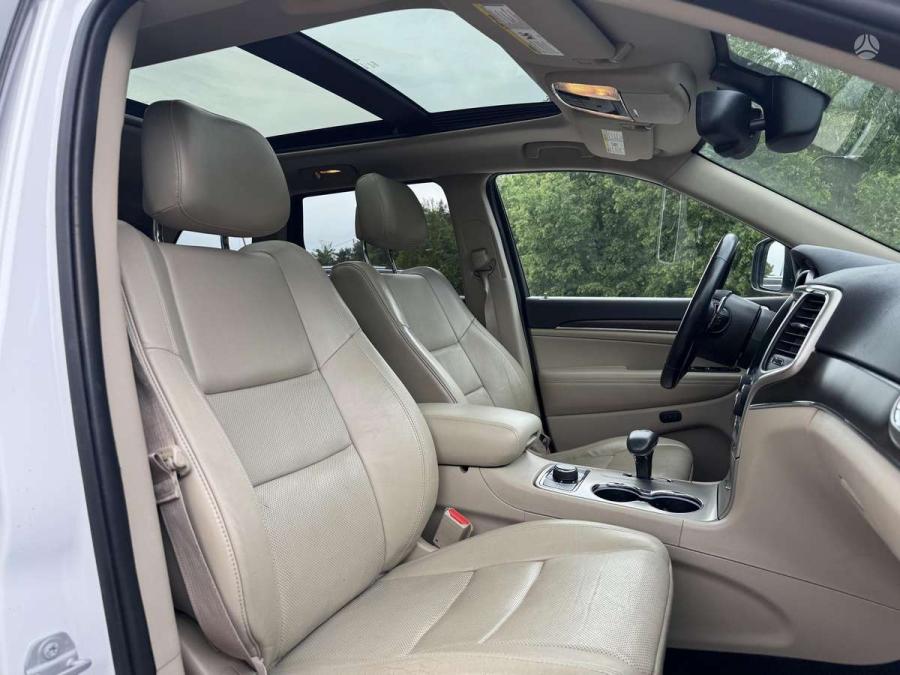 Balts Jeep Grand Cherokee 2015 Viļņa, ar dzinēja tilpumu 3.60 L un nobraukumu 198 tūkst. km par 14100 €, foto 18 vietnē AUTOMOTO.COM.LV