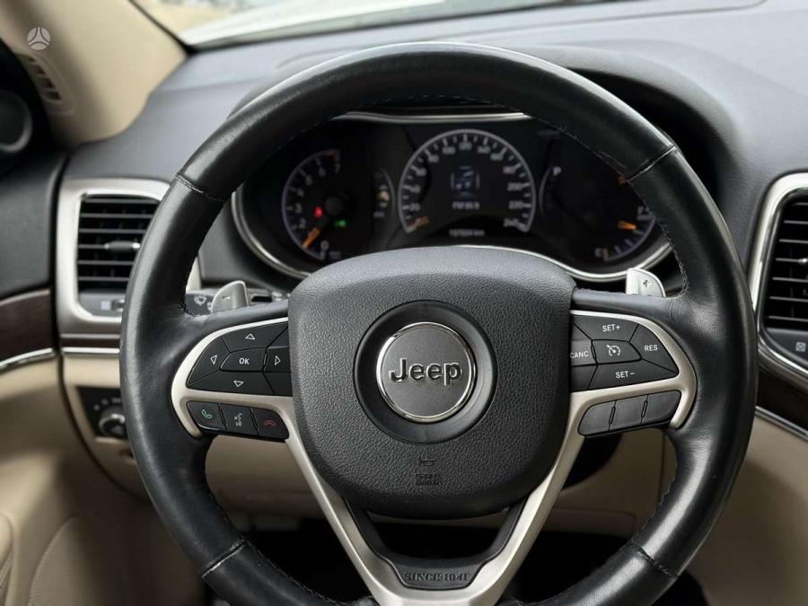 Balts Jeep Grand Cherokee 2015 Viļņa, ar dzinēja tilpumu 3.60 L un nobraukumu 198 tūkst. km par 14100 €, foto 24 vietnē AUTOMOTO.COM.LV