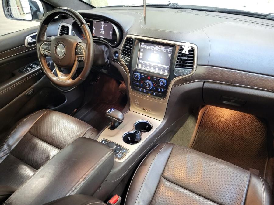 White Jeep Grand Cherokee 2016 in Vilnius, with an engine capacity of 3.00 L and mileage of 119 thousand km for 14990 €, photo 23 on AUTOMOTO.COM.LV
