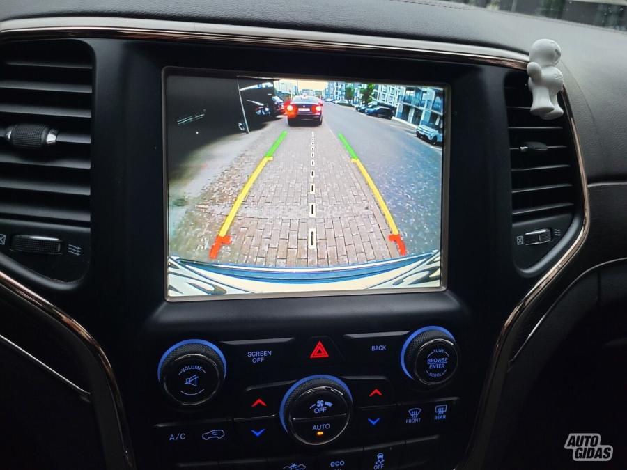 White Jeep Grand Cherokee 2016 in Vilnius, with an engine capacity of 3.00 L and mileage of 119 thousand km for 14990 €, photo 27 on AUTOMOTO.COM.LV