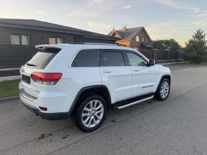 White Jeep Grand Cherokee 2017 in Klaipeda, with an engine capacity of 3.60 L and mileage of 175 thousand km for 15200 €, photo 5 on AUTOMOTO.COM.LV