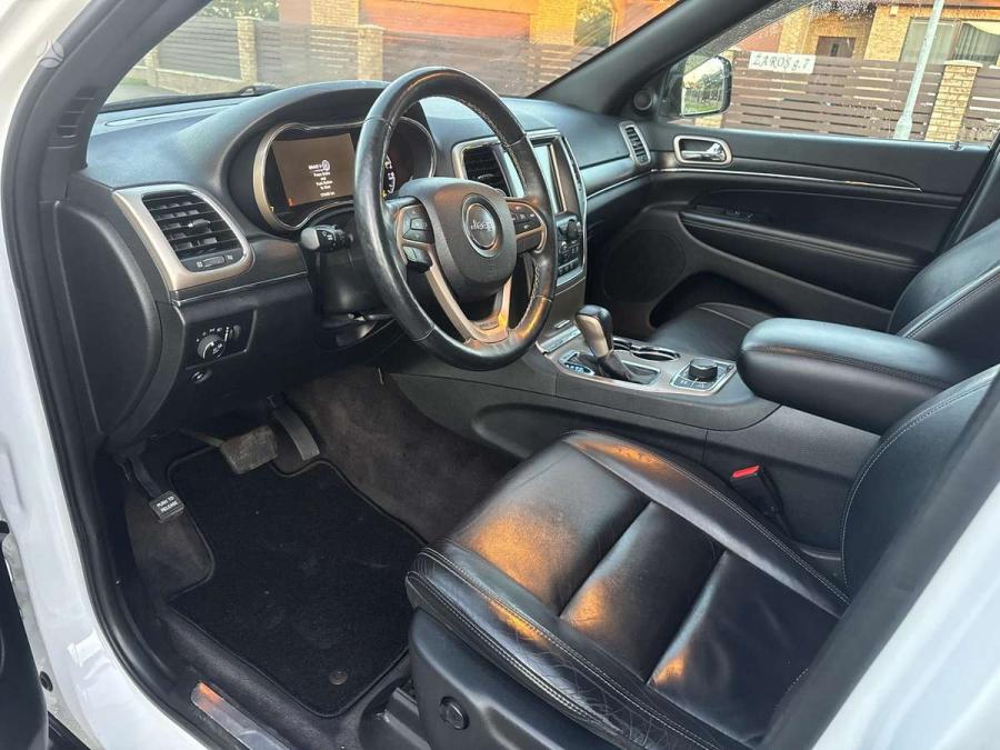 White Jeep Grand Cherokee 2017 in Klaipeda, with an engine capacity of 3.60 L and mileage of 175 thousand km for 15200 €, photo 11 on AUTOMOTO.COM.LV