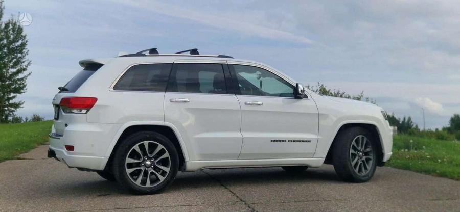 Balts Jeep Grand Cherokee 2017 Šauļi, ar dzinēja tilpumu 5.65 L un nobraukumu 230 tūkst. km par 18000 €, foto 21 vietnē AUTOMOTO.COM.LV