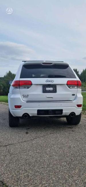 Balts Jeep Grand Cherokee 2017 Šauļi, ar dzinēja tilpumu 5.65 L un nobraukumu 230 tūkst. km par 18000 €, foto 22 vietnē AUTOMOTO.COM.LV