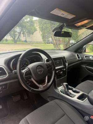 White Jeep Grand Cherokee 2018 in Kazlu Ruda, with an engine capacity of 3.60 L and mileage of 182 thousand km for 14200 €, photo 10 on AUTOMOTO.COM.LV