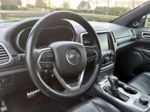 White Jeep Grand Cherokee 2018 in Klaipeda, with an engine capacity of 5.65 L and mileage of 109 thousand km for 26990 €, photo 16 on AUTOMOTO.COM.LV