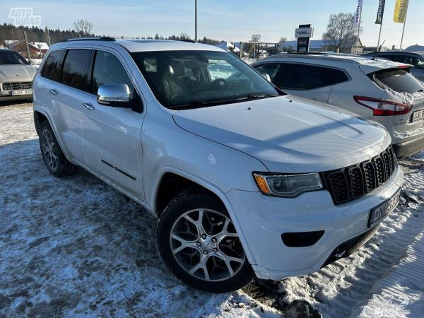 White Jeep Grand Cherokee 2019 in Avizieniai, with an engine capacity of 5.70 L and mileage of 143 thousand km for 21900 €, photo 1 on AUTOMOTO.COM.LV