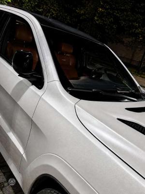 White Jeep Grand Cherokee 2019 in Mazeikiai, with an engine capacity of 6.42 L and mileage of 121 thousand km for 39900 €, photo 36 on AUTOMOTO.COM.LV