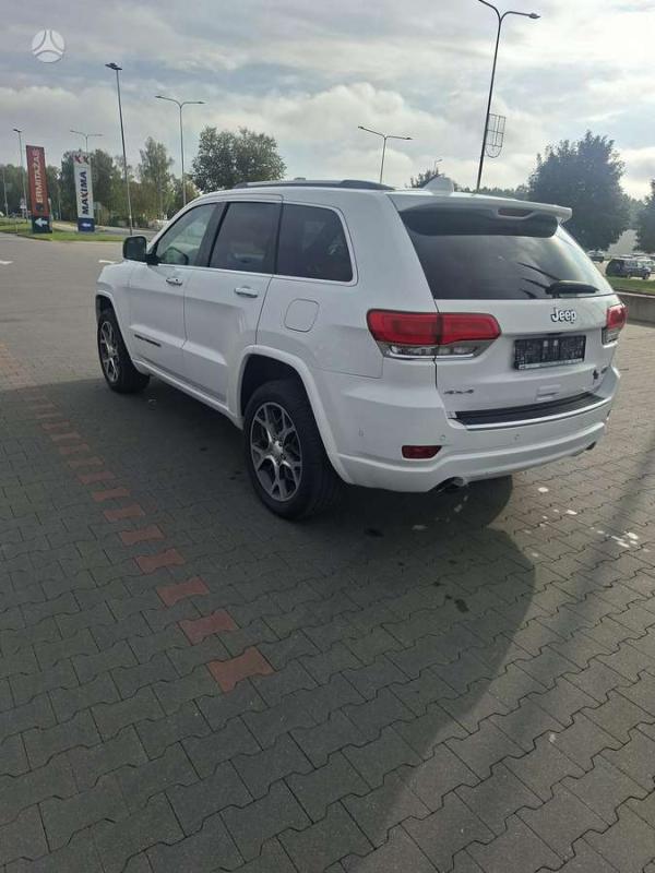 White Jeep Grand Cherokee 2020 in Utena, with an engine capacity of 2.99 L and mileage of 252 thousand km for 15300 €, photo 6 on AUTOMOTO.COM.LV