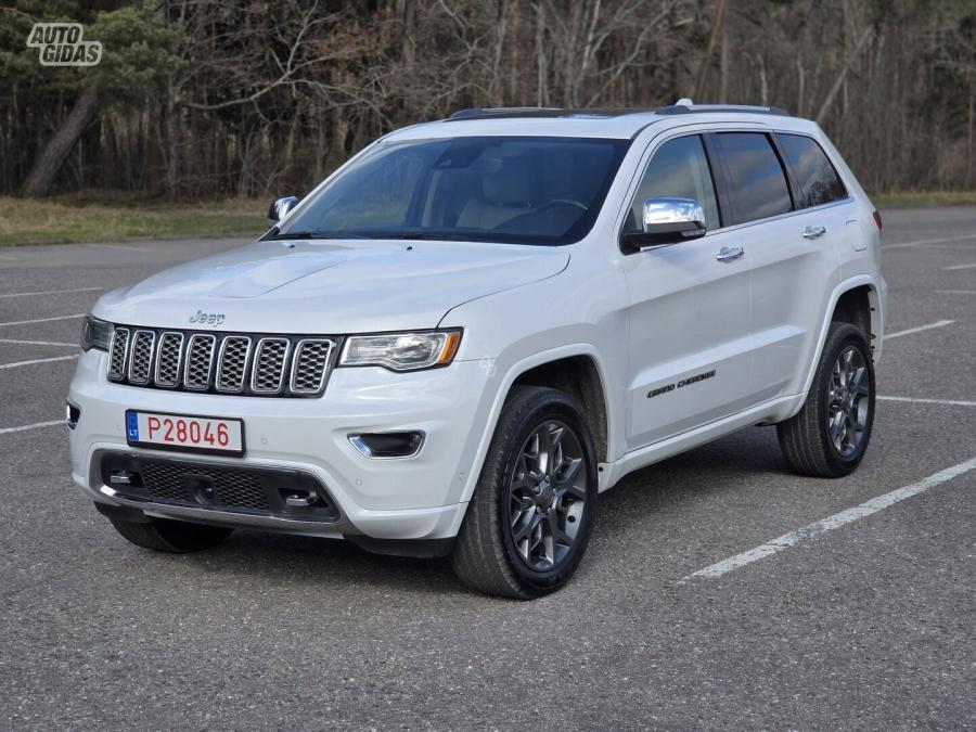 White Jeep Grand Cherokee 2021 in Klaipeda, with an engine capacity of 5.70 L and mileage of 98 thousand km for 23600 €, photo 1 on AUTOMOTO.COM.LV