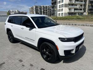 White Jeep Grand Cherokee 2023 in Vilnius, with an engine capacity of 3.60 L and mileage of 111 thousand km for 29900 €, photo  on AUTOMOTO.COM.LV