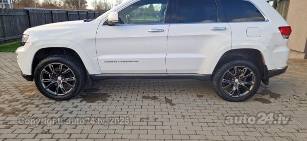 Balts Jeep Grand Cherokee 2015 Tallina, ar dzinēja tilpumu 3.00 L un nobraukumu 249 tūkst. km par 13400 €, foto 4 vietnē AUTOMOTO.COM.LV