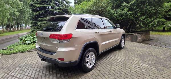 Dzeltens Jeep Grand Cherokee 2015 Klaipėda, ar dzinēja tilpumu 3.60 L un nobraukumu 319 tūkst. km par 7600 €, foto 2 vietnē AUTOMOTO.COM.LV