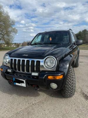 Black Jeep Liberty 2002 in Utena, with an engine capacity of 3.70 L and mileage of 171 thousand km for 2300 €, photo 9 on AUTOMOTO.COM.LV