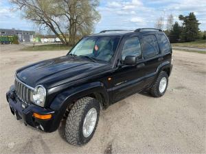 Black Jeep Liberty 2002 in Utena, with an engine capacity of 3.70 L and mileage of 171 thousand km for 2300 €, photo 10 on AUTOMOTO.COM.LV