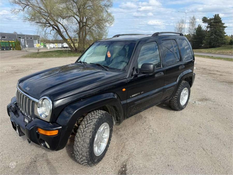 Black Jeep Liberty 2002 in Utena, with an engine capacity of 3.70 L and mileage of 171 thousand km for 2300 €, photo 10 on AUTOMOTO.COM.LV