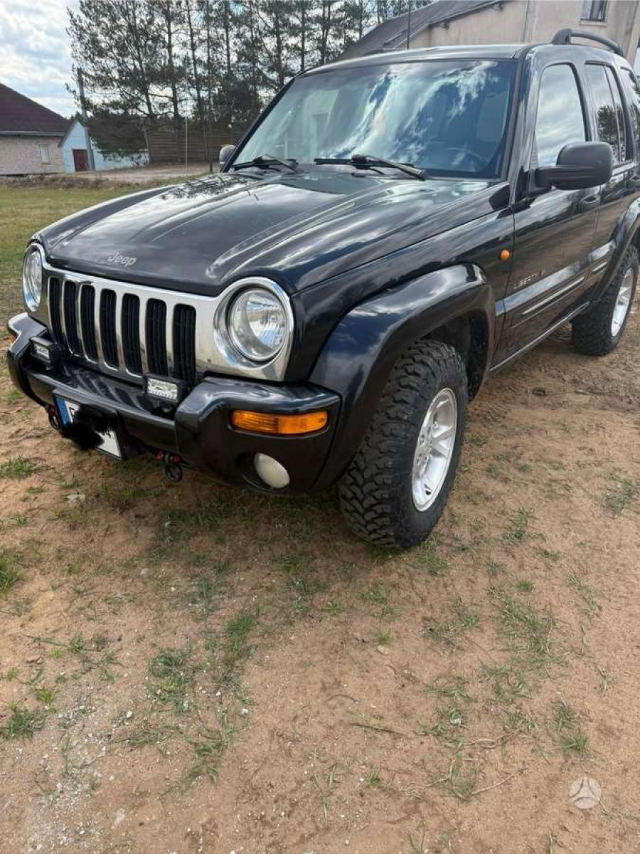Black Jeep Liberty 2002 in Utena, with an engine capacity of 3.70 L and mileage of 171 thousand km for 2300 €, photo 16 on AUTOMOTO.COM.LV