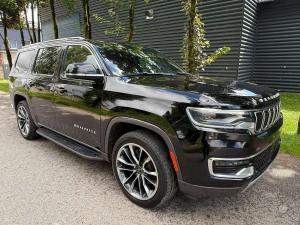 Black Jeep Wagoneer 2022 in Kaunas, with an engine capacity of 5.65 L and mileage of 115 thousand km for 33900 €, photo  on AUTOMOTO.COM.LV