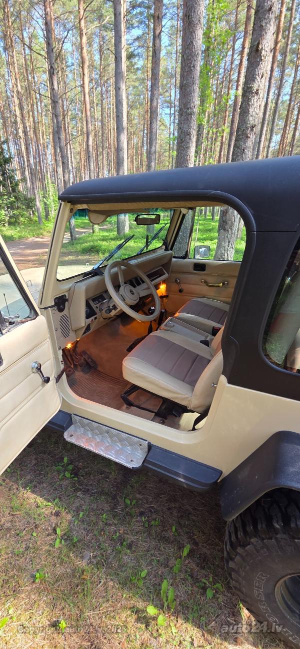 Smilšu krāsa Jeep Wrangler 1989 Tallina, ar dzinēja tilpumu 2.50 L un nobraukumu 310 tūkst. km par 13000 €, foto 9 vietnē AUTOMOTO.COM.LV