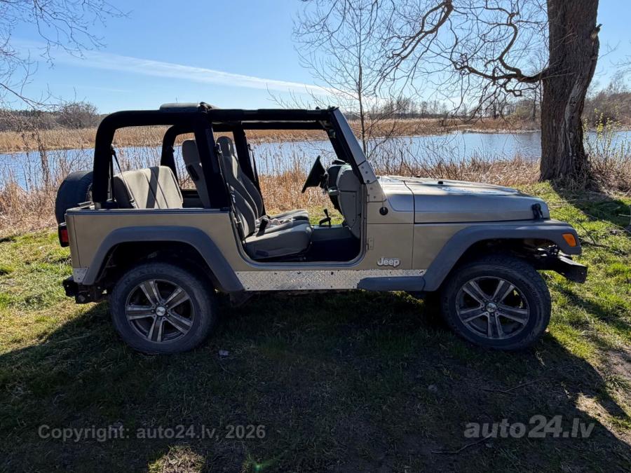 Smilšu krāsa Jeep Wrangler 2006 Tartu, ar dzinēja tilpumu 4.00 L un nobraukumu 240 tūkst. km par 15500 €, foto 1 vietnē AUTOMOTO.COM.LV