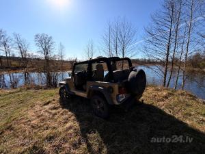 Smilšu krāsa Jeep Wrangler 2006 Tartu, ar dzinēja tilpumu 4.00 L un nobraukumu 240 tūkst. km par 15500 €, foto 7 vietnē AUTOMOTO.COM.LV