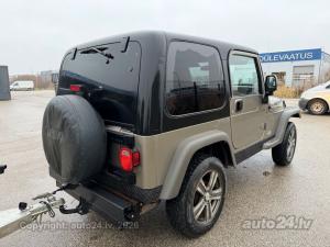 Smilšu krāsa Jeep Wrangler 2006 Tartu, ar dzinēja tilpumu 4.00 L un nobraukumu 240 tūkst. km par 15500 €, foto 11 vietnē AUTOMOTO.COM.LV