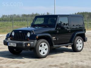 Black Jeep Wrangler 2012 in Valmiera, with an engine capacity of 2.80 L and mileage of 240 thousand km for 16995 €, photo  on AUTOMOTO.COM.LV