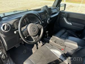 Melns Jeep Wrangler 2012 Valmiera, ar dzinēja tilpumu 2.80 L un nobraukumu 240 tūkst. km par 16995 €, foto 14 vietnē AUTOMOTO.COM.LV