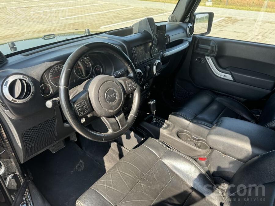 Melns Jeep Wrangler 2012 Valmiera, ar dzinēja tilpumu 2.80 L un nobraukumu 240 tūkst. km par 16995 €, foto 14 vietnē AUTOMOTO.COM.LV