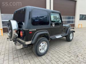 Black Jeep Wrangler 1988 in Jelgava, with an engine capacity of 2.50 L and mileage of 463 thousand km for 10000 €, photo 7 on AUTOMOTO.COM.LV
