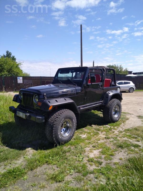 Black Jeep Wrangler 1999 in Liepaja, with an engine capacity of 4.00 L and mileage of 0 thousand km for 8200 €, photo 1 on AUTOMOTO.COM.LV