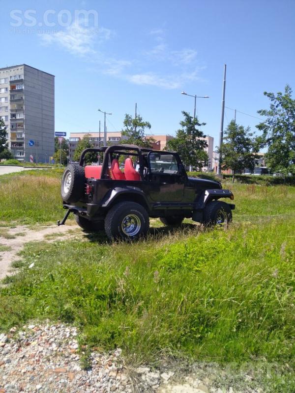 Black Jeep Wrangler 1999 in Liepaja, with an engine capacity of 4.00 L and mileage of 0 thousand km for 8200 €, photo 4 on AUTOMOTO.COM.LV