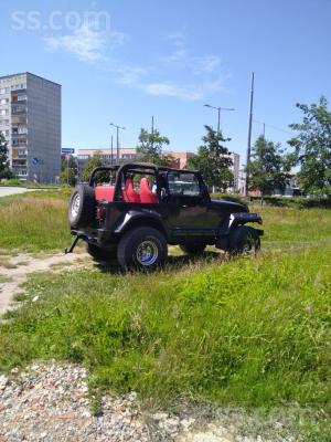 Black Jeep Wrangler 1999 in Liepaja, with an engine capacity of 4.00 L and mileage of 0 thousand km for 8200 €, photo 4 on AUTOMOTO.COM.LV