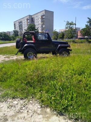 Black Jeep Wrangler 1999 in Liepaja, with an engine capacity of 4.00 L and mileage of 0 thousand km for 8200 €, photo 5 on AUTOMOTO.COM.LV