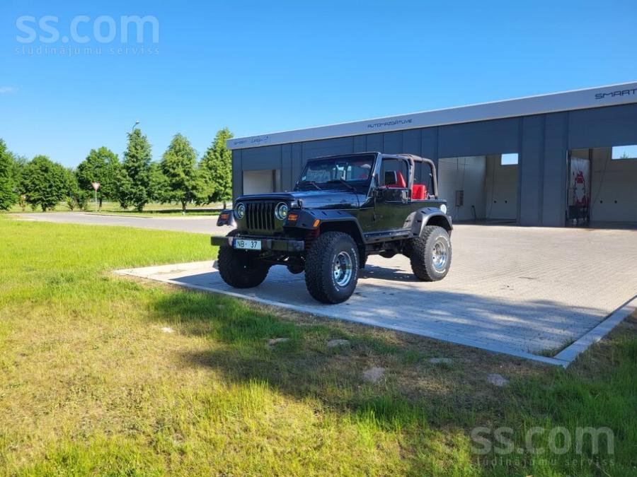 Melns Jeep Wrangler 1999 Rīga, ar dzinēja tilpumu 4.00 L un nobraukumu 179 tūkst. km par 9200 €, foto 3 vietnē AUTOMOTO.COM.LV