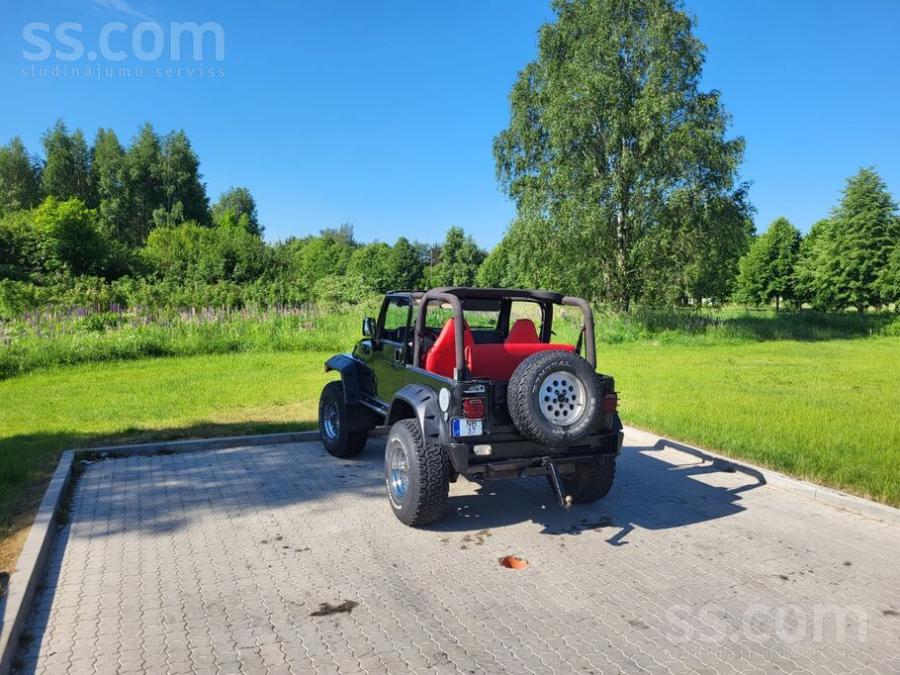 Melns Jeep Wrangler 1999 Rīga, ar dzinēja tilpumu 4.00 L un nobraukumu 179 tūkst. km par 9200 €, foto 4 vietnē AUTOMOTO.COM.LV