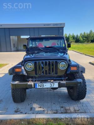 Melns Jeep Wrangler 1999 Rīga, ar dzinēja tilpumu 4.00 L un nobraukumu 179 tūkst. km par 9200 €, foto 5 vietnē AUTOMOTO.COM.LV