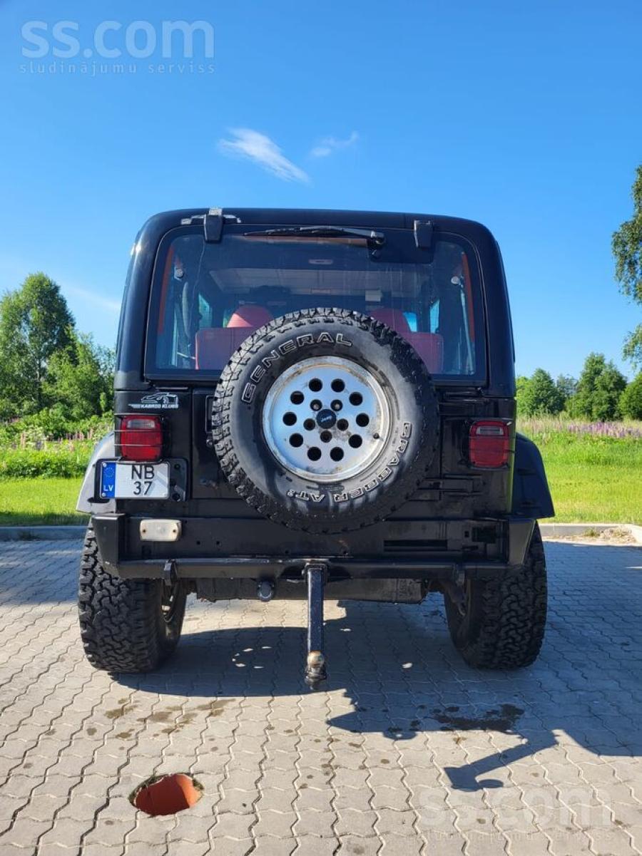 Melns Jeep Wrangler 1999 Rīga, ar dzinēja tilpumu 4.00 L un nobraukumu 179 tūkst. km par 9200 €, foto 6 vietnē AUTOMOTO.COM.LV