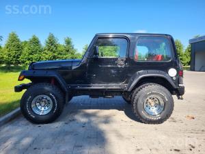 Melns Jeep Wrangler 1999 Rīga, ar dzinēja tilpumu 4.00 L un nobraukumu 179 tūkst. km par 9200 €, foto 7 vietnē AUTOMOTO.COM.LV