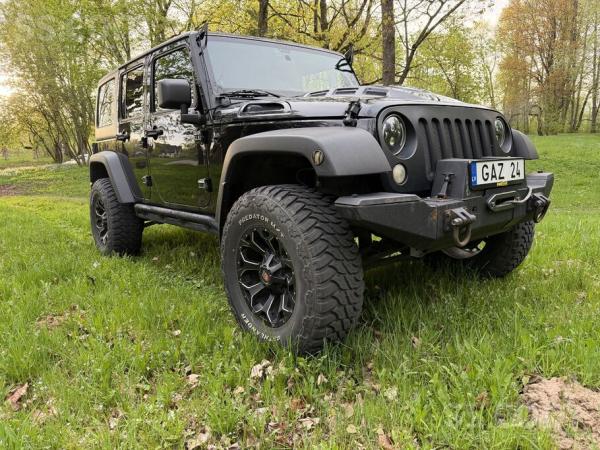 Melns Jeep Wrangler 2011 Rīga, ar dzinēja tilpumu 2.80 L un nobraukumu 184 tūkst. km par 24500 €, foto 2 vietnē AUTOMOTO.COM.LV