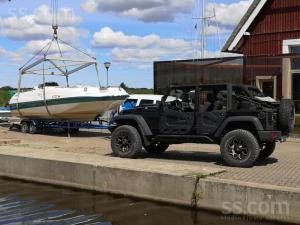 Melns Jeep Wrangler 2011 Rīga, ar dzinēja tilpumu 2.80 L un nobraukumu 184 tūkst. km par 24500 €, foto 18 vietnē AUTOMOTO.COM.LV