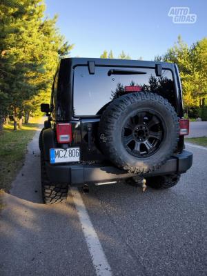 Black Jeep Wrangler 2011 in Vilnius, with an engine capacity of 3.80 L and mileage of 271 thousand km for 15900 €, photo 5 on AUTOMOTO.COM.LV