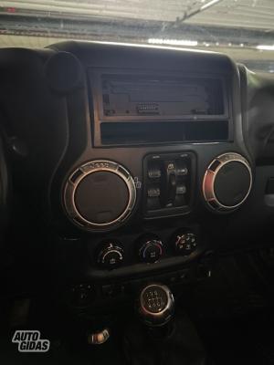 Black Jeep Wrangler 2011 in Vilnius, with an engine capacity of 3.80 L and mileage of 271 thousand km for 15900 €, photo 10 on AUTOMOTO.COM.LV