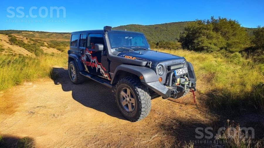 Black Jeep Wrangler 2012 in Riga, with an engine capacity of 2.80 L and mileage of 0 thousand km for 20950 €, photo 5 on AUTOMOTO.COM.LV